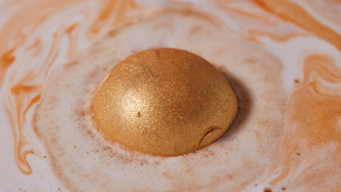 Lush dyes its bath bombs gold to raise awareness about childhood cancer